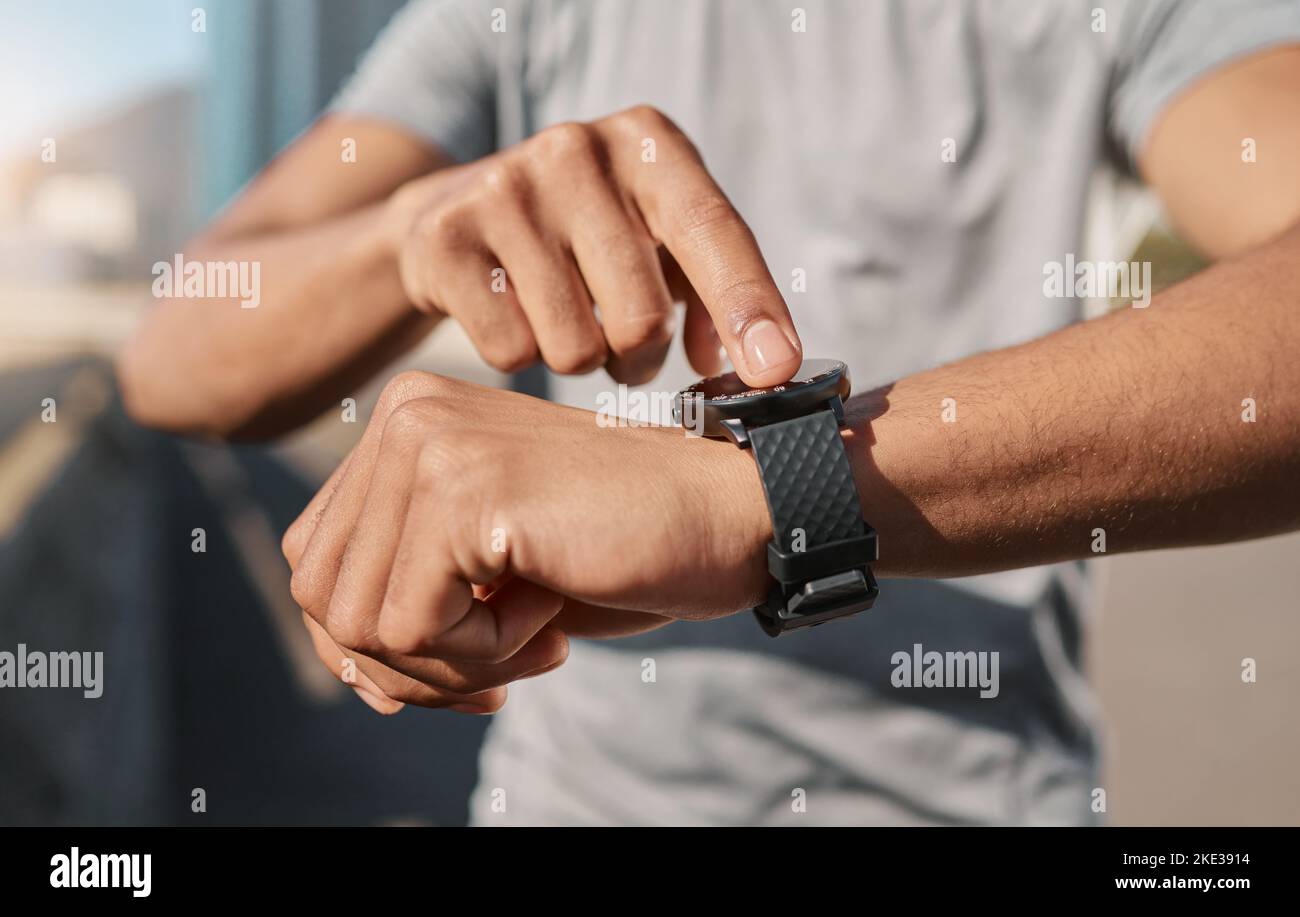Fitness, city and smartwatch of a man hands training, workout or ...