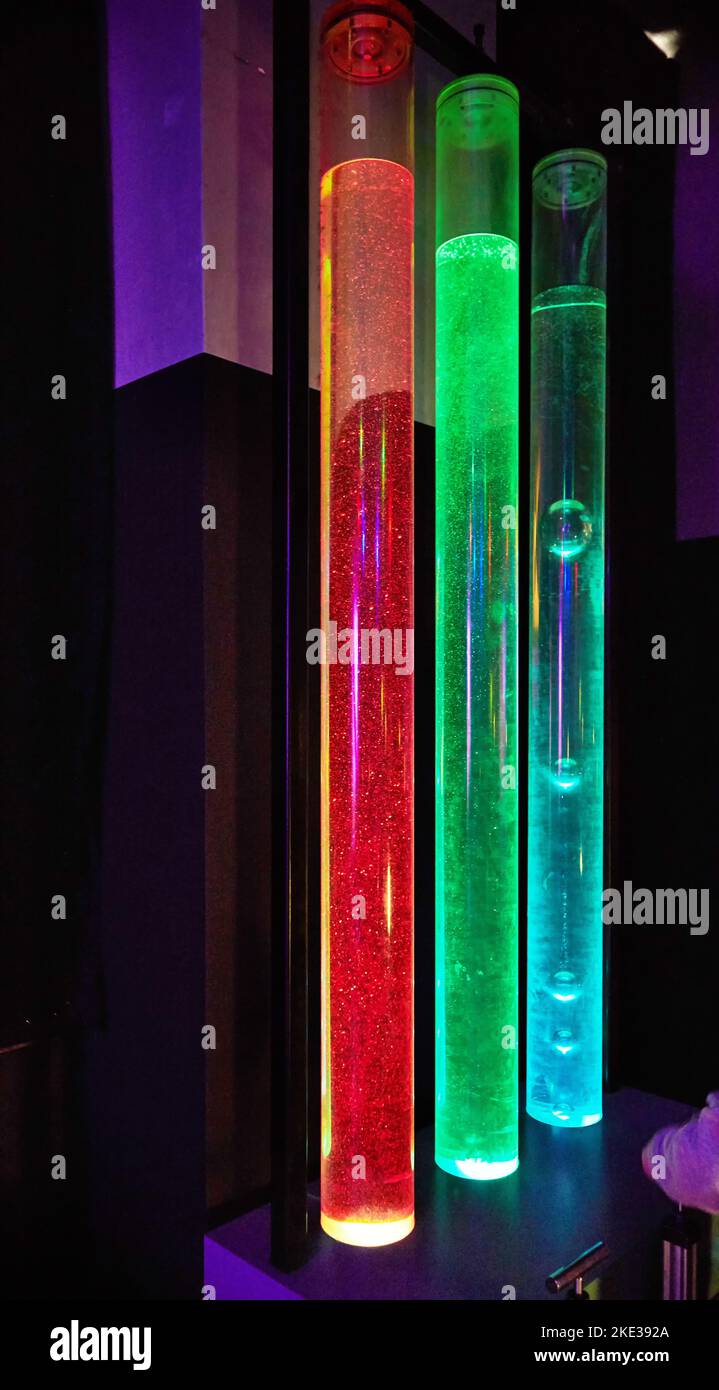 Transparent tubes with multi-colored liquid of different densities for ...