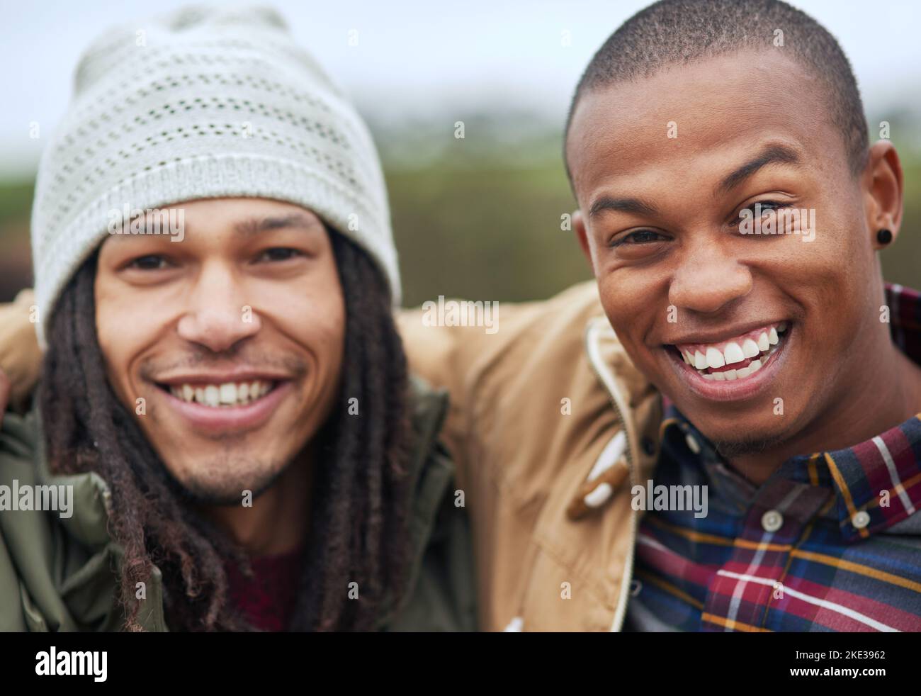 The dynamic duo strike a pose. Portrait of two friends posing together ...