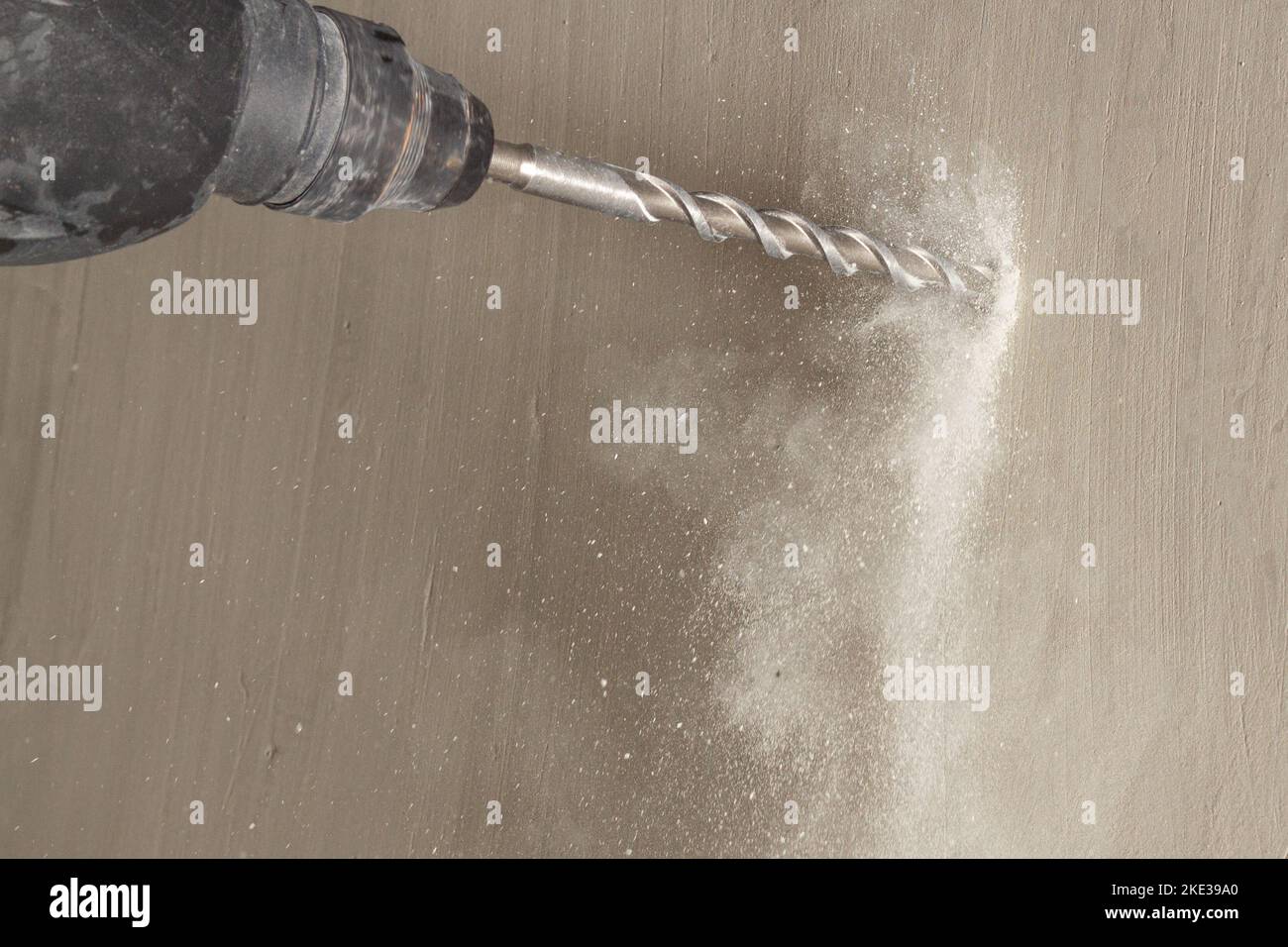 Workflow while drilling a wall with a perforator. Home renovation ...