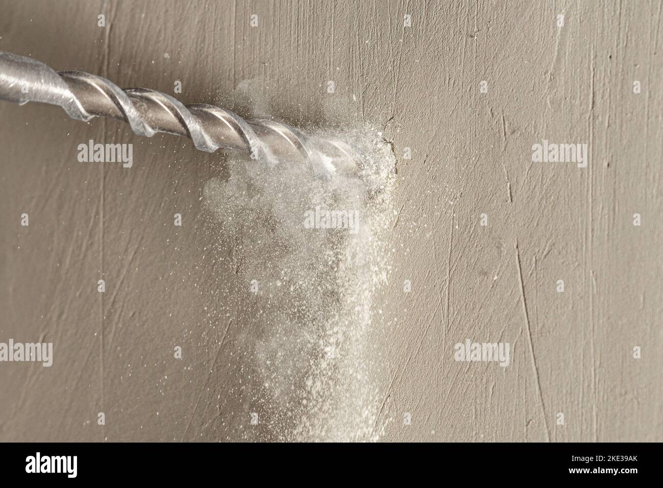 Workflow while drilling a wall with a perforator. Home renovation ...