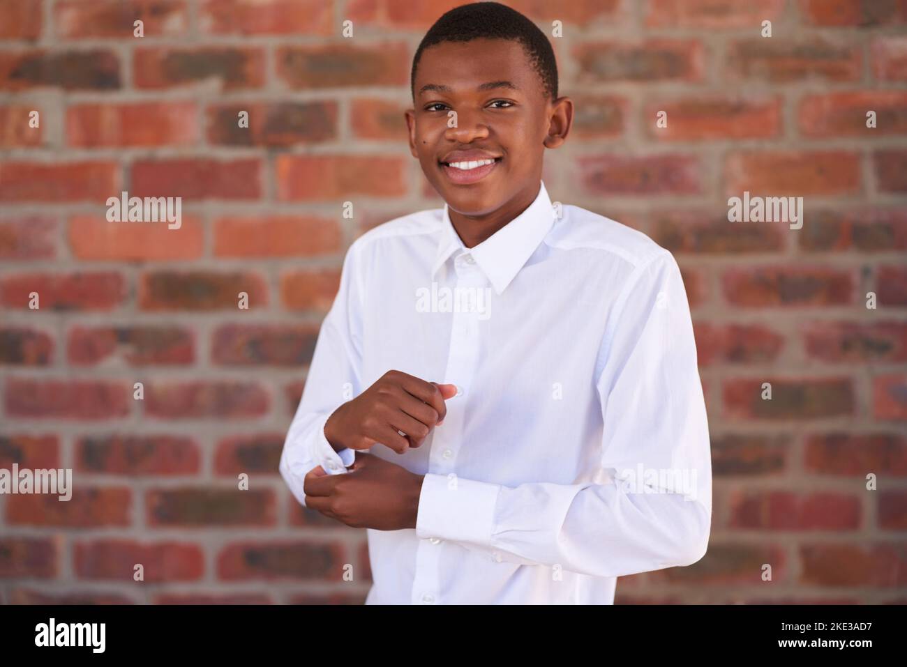 Dressed for success. Portrait of a young student standing in the ...