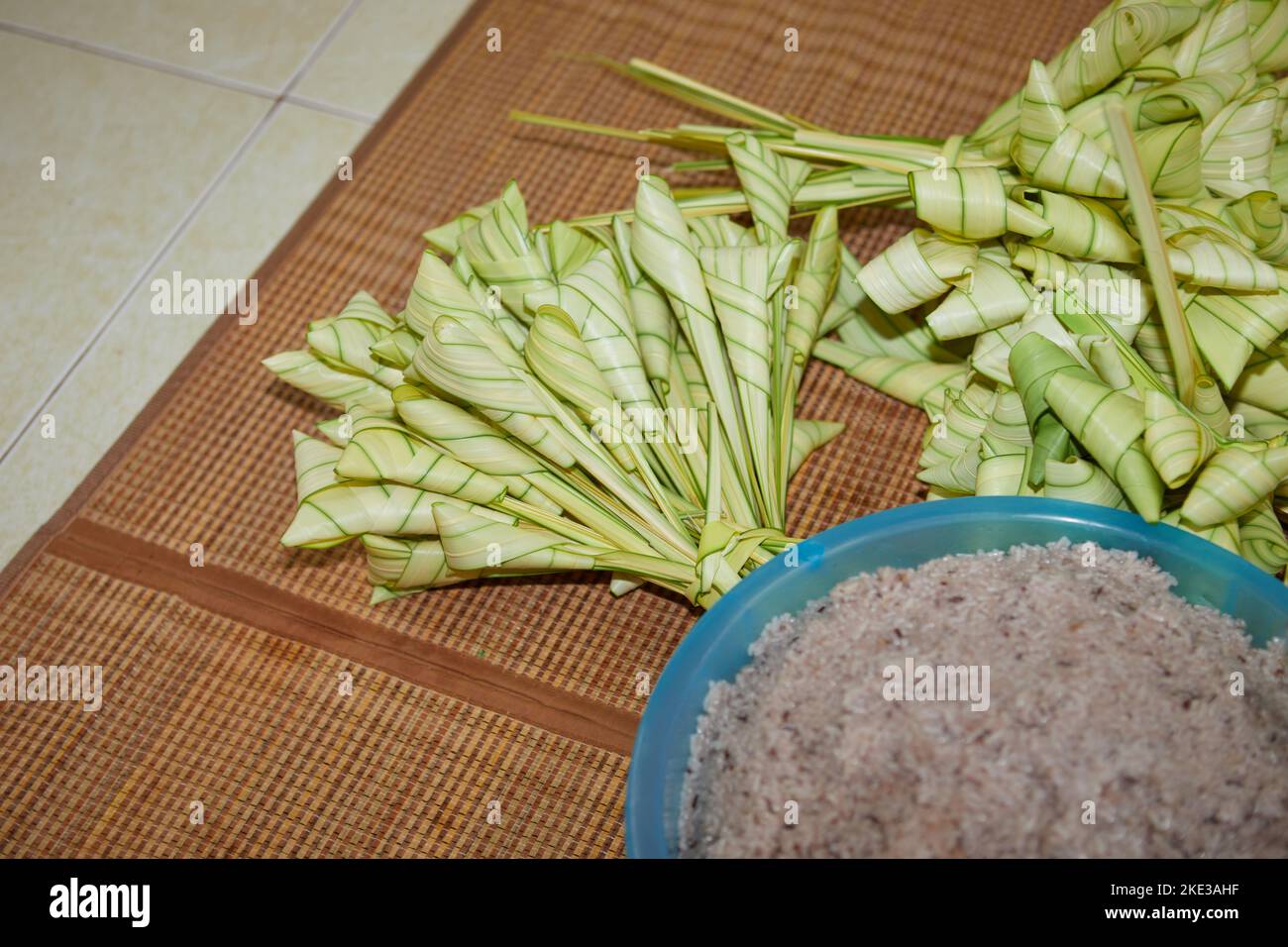 Preparing of the triangular sticky rice wrapped with palm leaf or ...