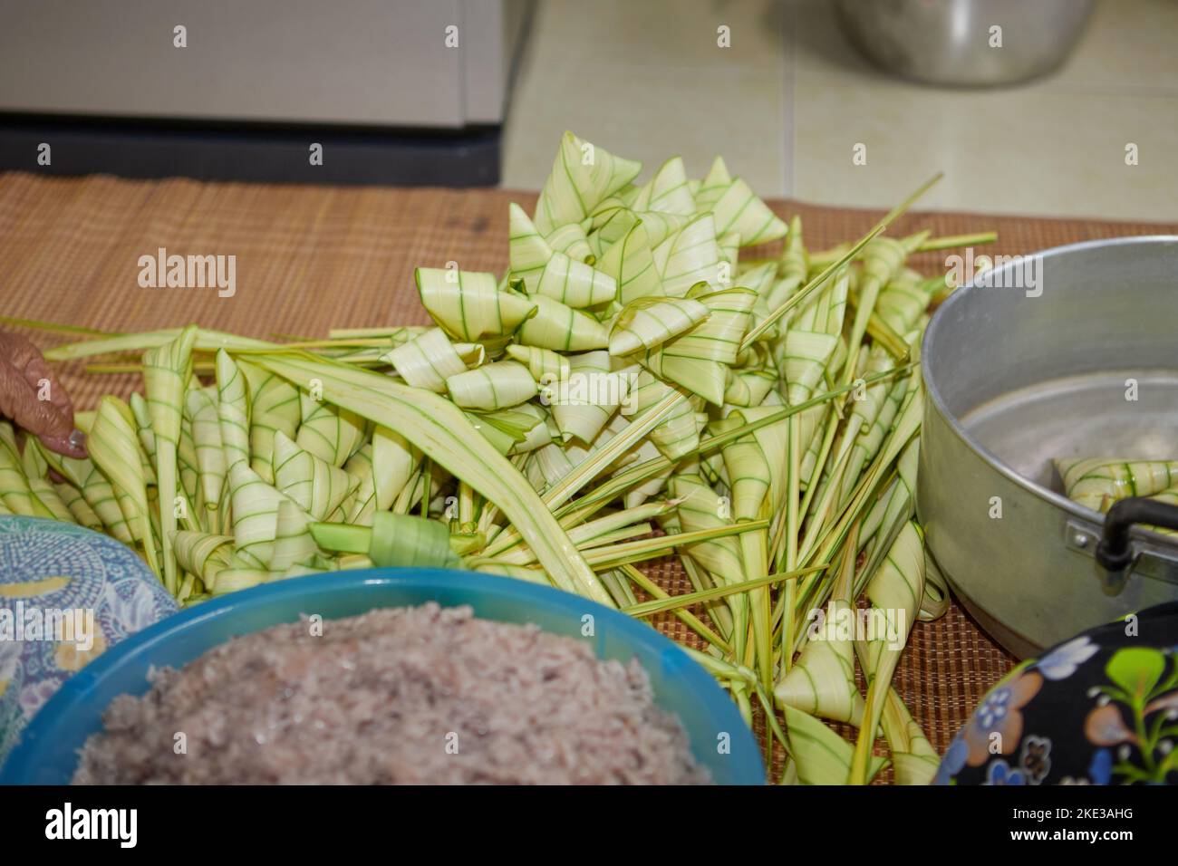 Preparing of the triangular sticky rice wrapped with palm leaf or ...