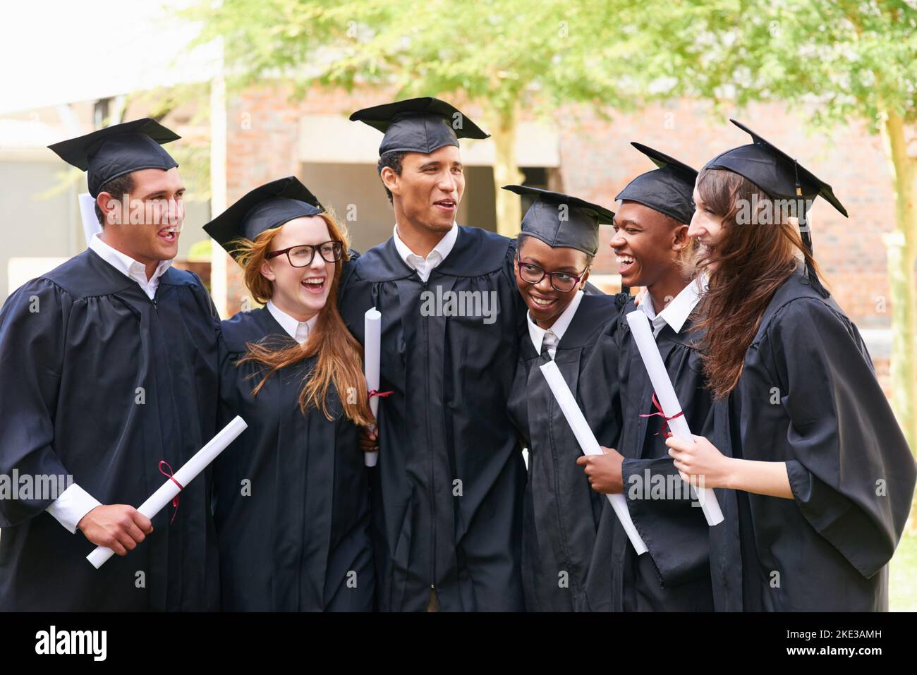 They made it here together. a happy group of students standing outside ...