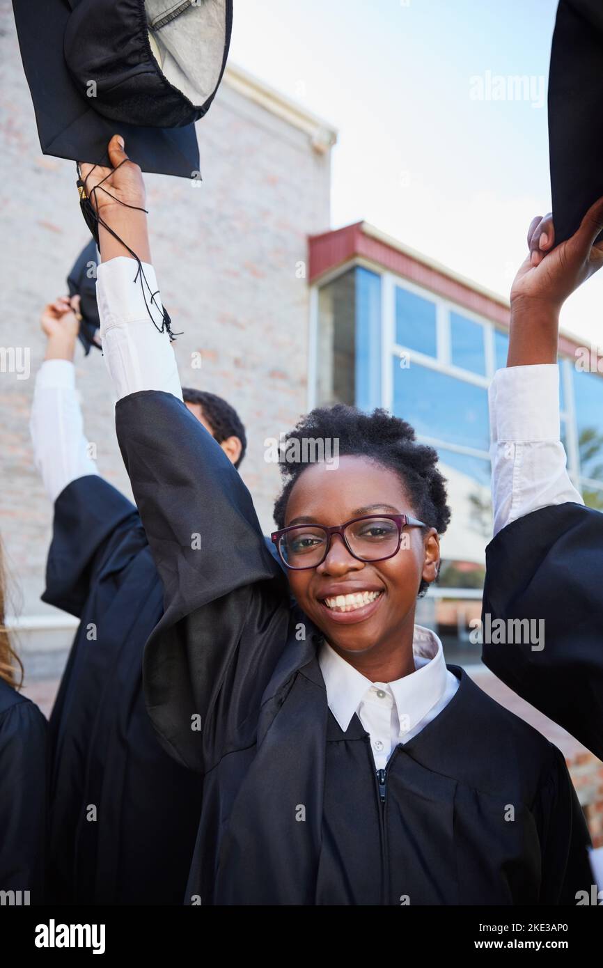 Enjoying every minute of graduation. Portrait of a happy female student ...