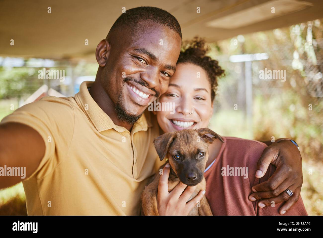 Love, dog and selfie with a couple and their adopted pet posing for a ...