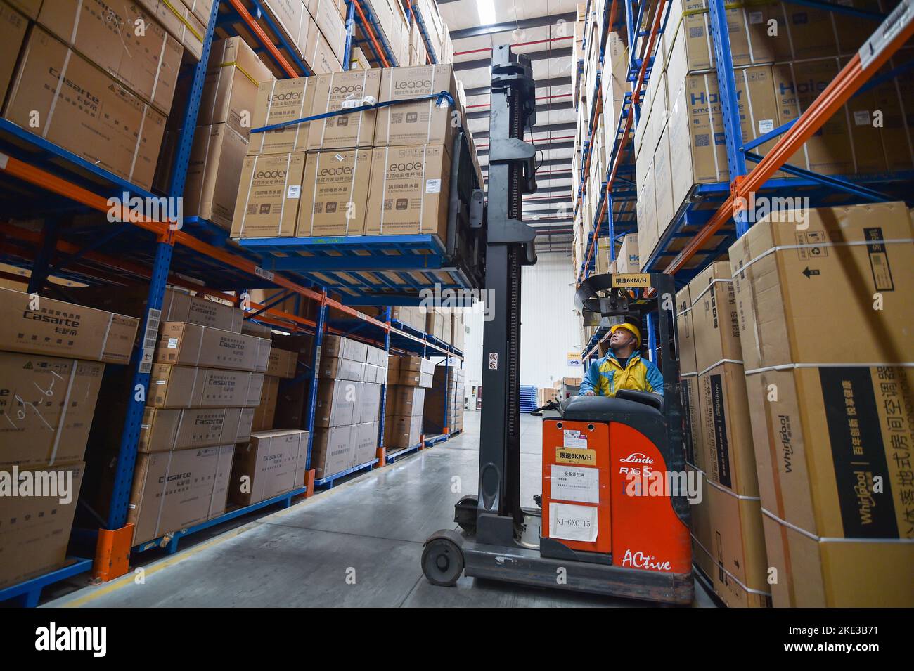 NANJING, CHINA - NOVEMBER 10, 2022 - A worker moves goods with a ...