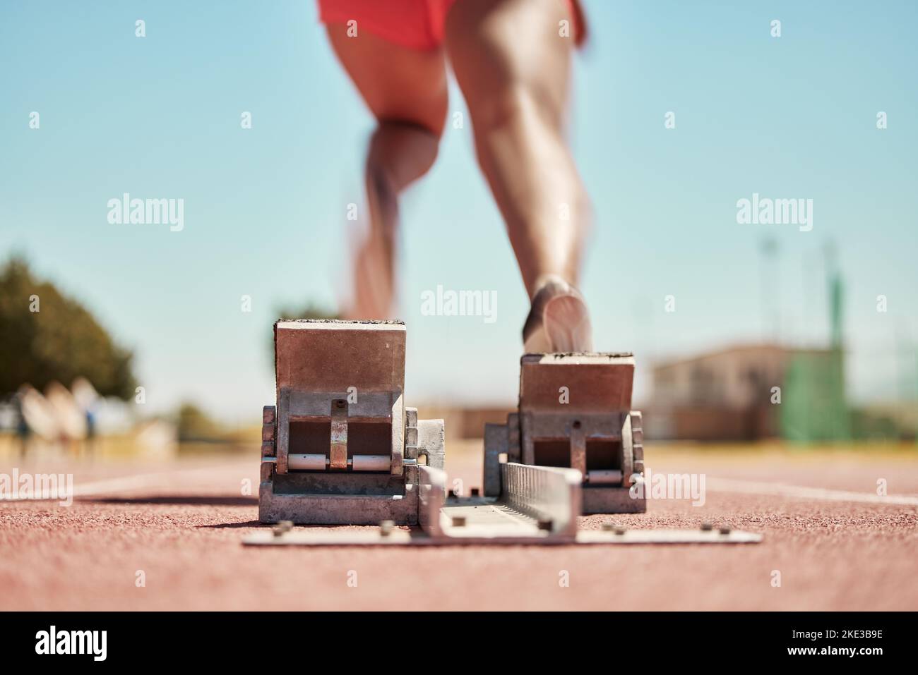 Stadium, back view and runner on start blocks for sprint, race or ...