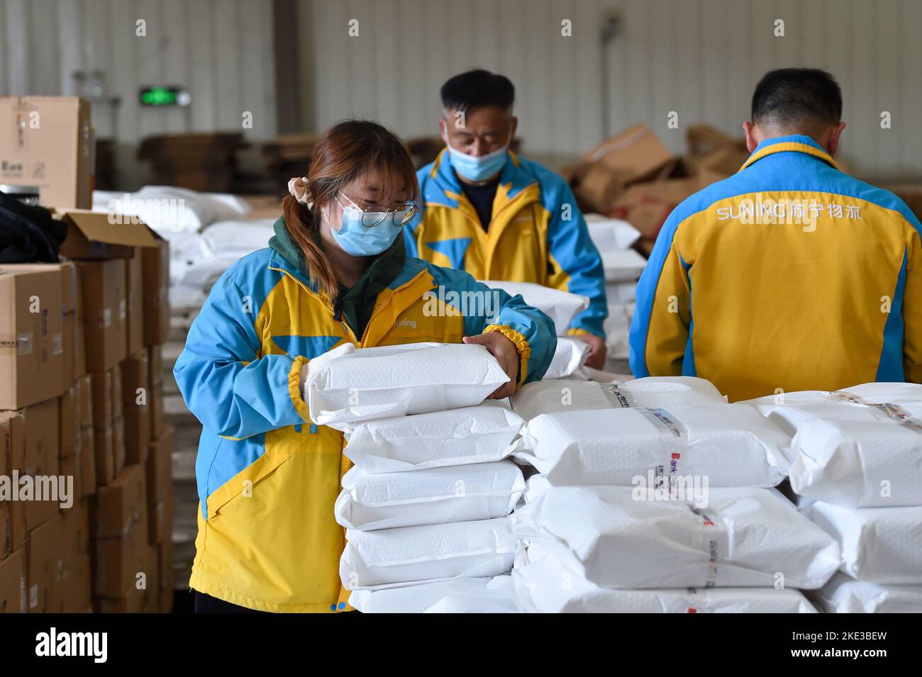 NANJING, CHINA - NOVEMBER 10, 2022 - A worker packs goods at Suning ...