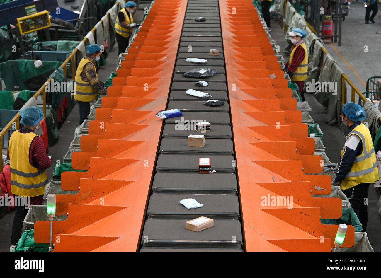 HANDAN, CHINA - NOVEMBER 10, 2022 - Staff members work next to ...