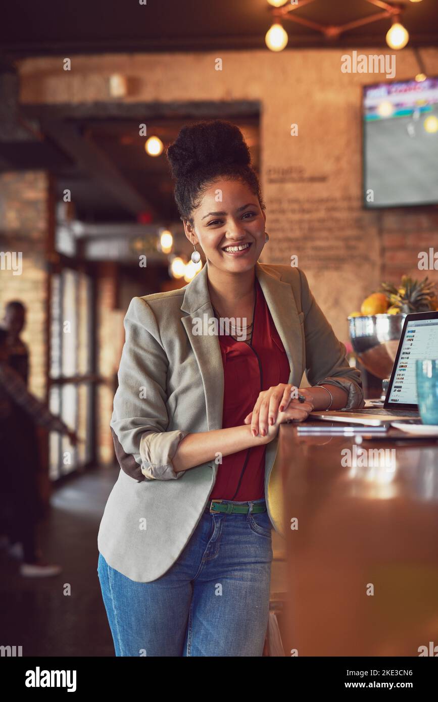 Came to my favourite cafe to get some work done. Portrait of a young ...