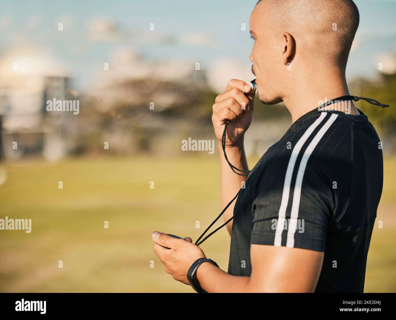 Coach, whistle and sport training with stopwatch, exercise and time ...
