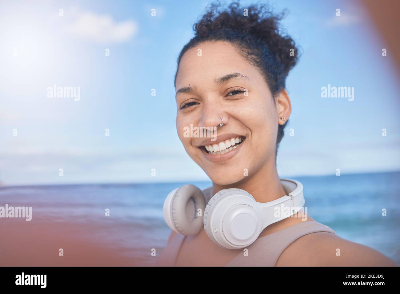 Woman, fitness selfie, happy at beach with smile for workout, exercise ...