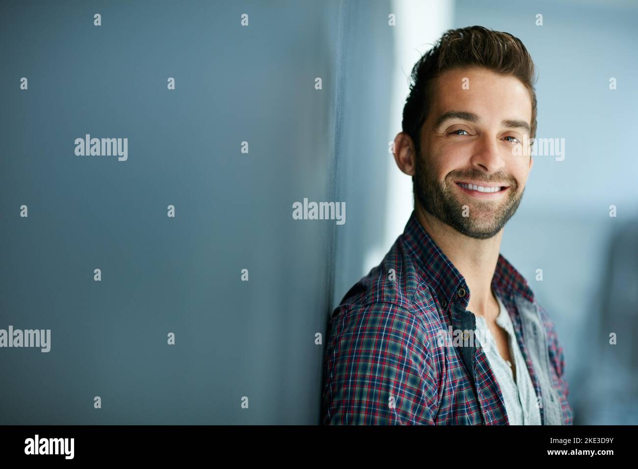His self-confidence shines through. Portrait of a confident young man ...