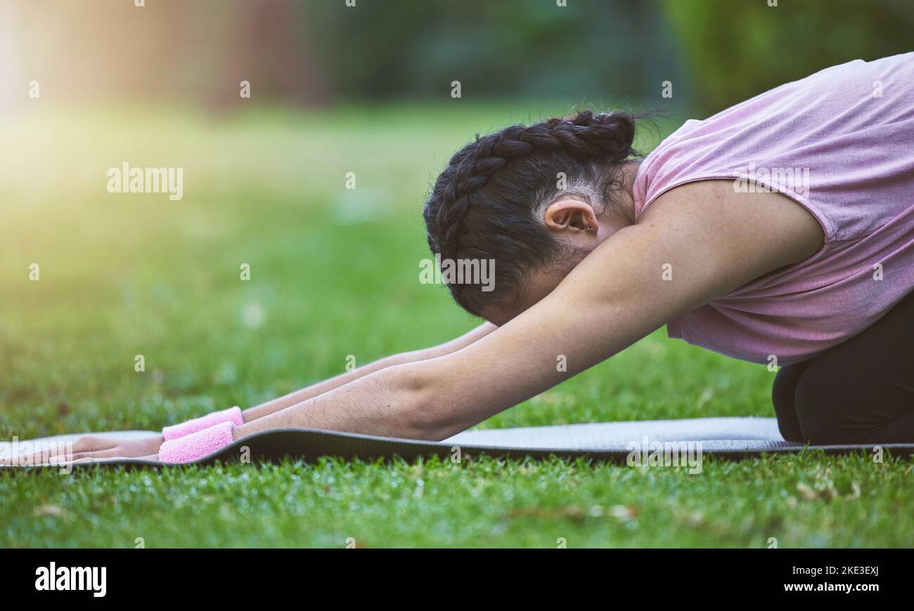 Yoga, exercise and nature with woman doing wellness exercise for health ...