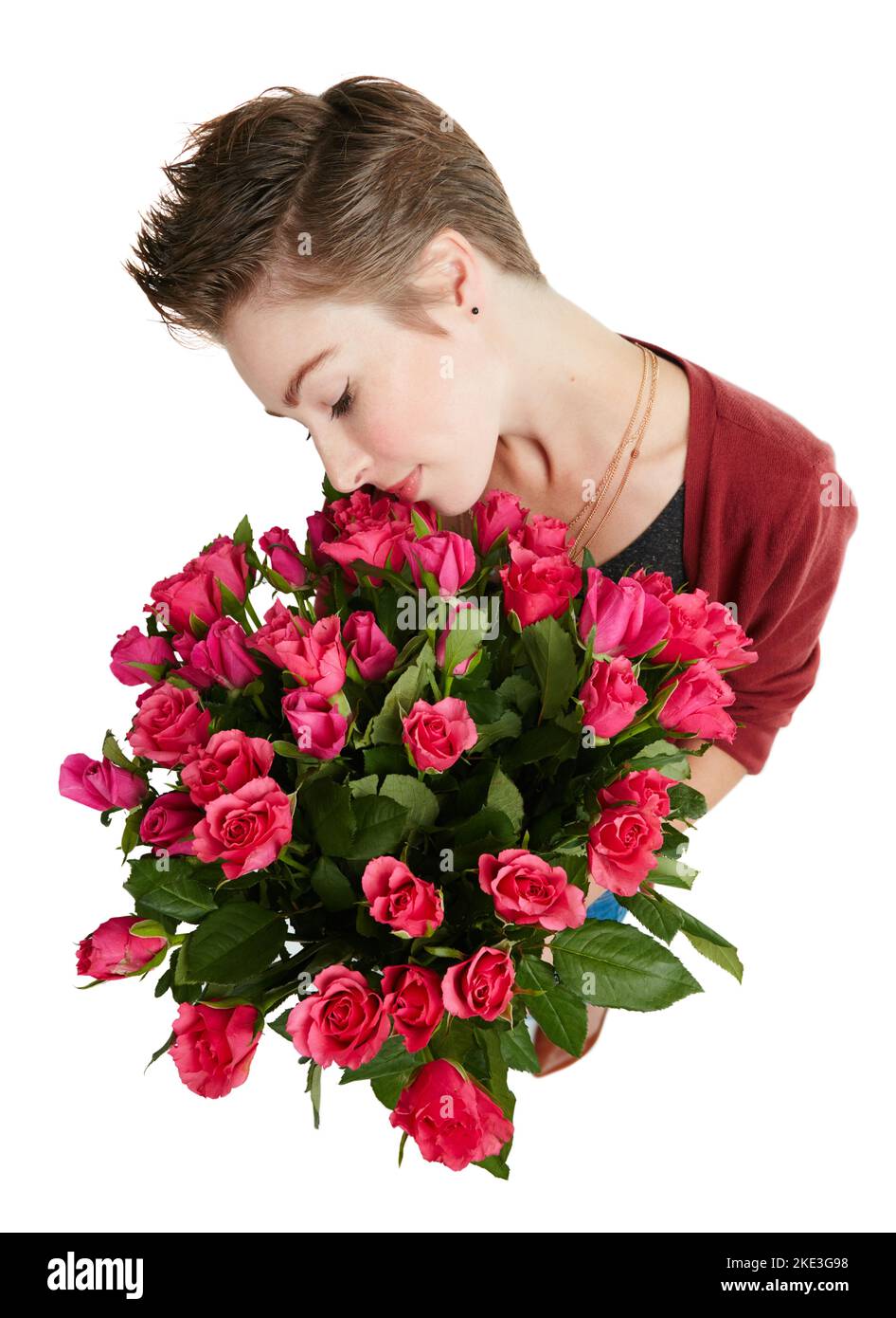 They look as beautiful as they smell. Studio shot of a young woman ...