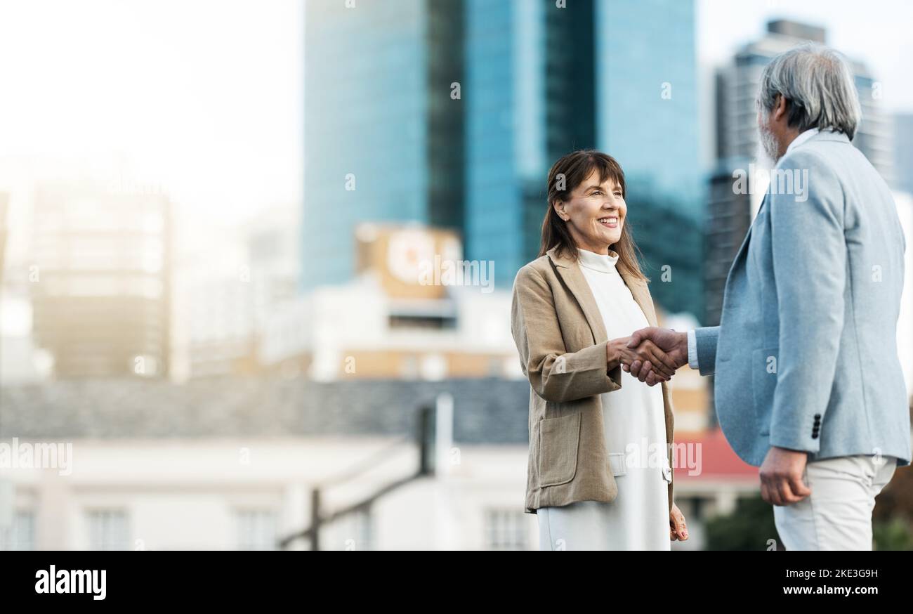 Business people, handshake and partnership deal in the city for ...