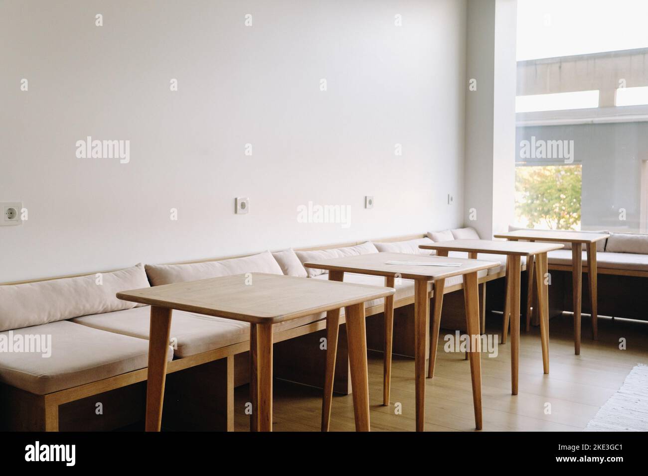 Tables standing in the interior. Places to sit in a cafe Stock Photo ...