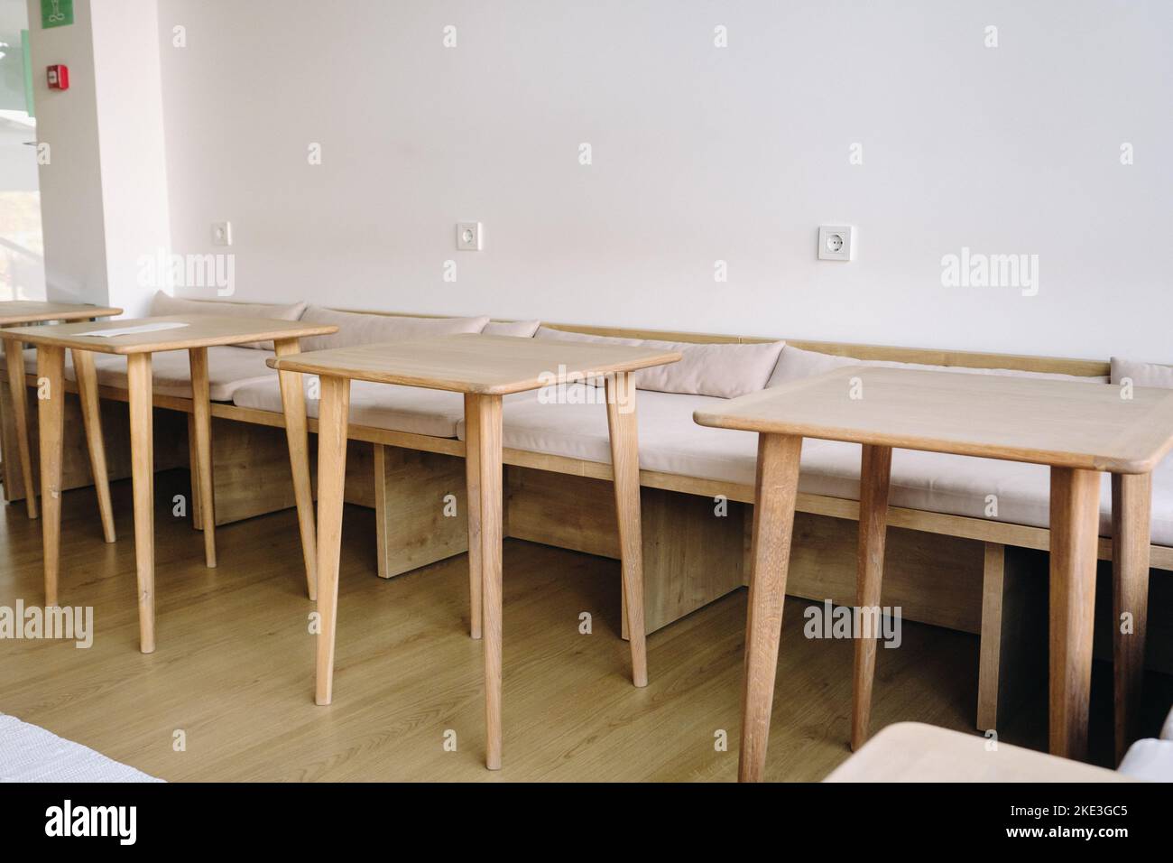 Tables standing in the interior. Places to sit in a cafe Stock Photo ...