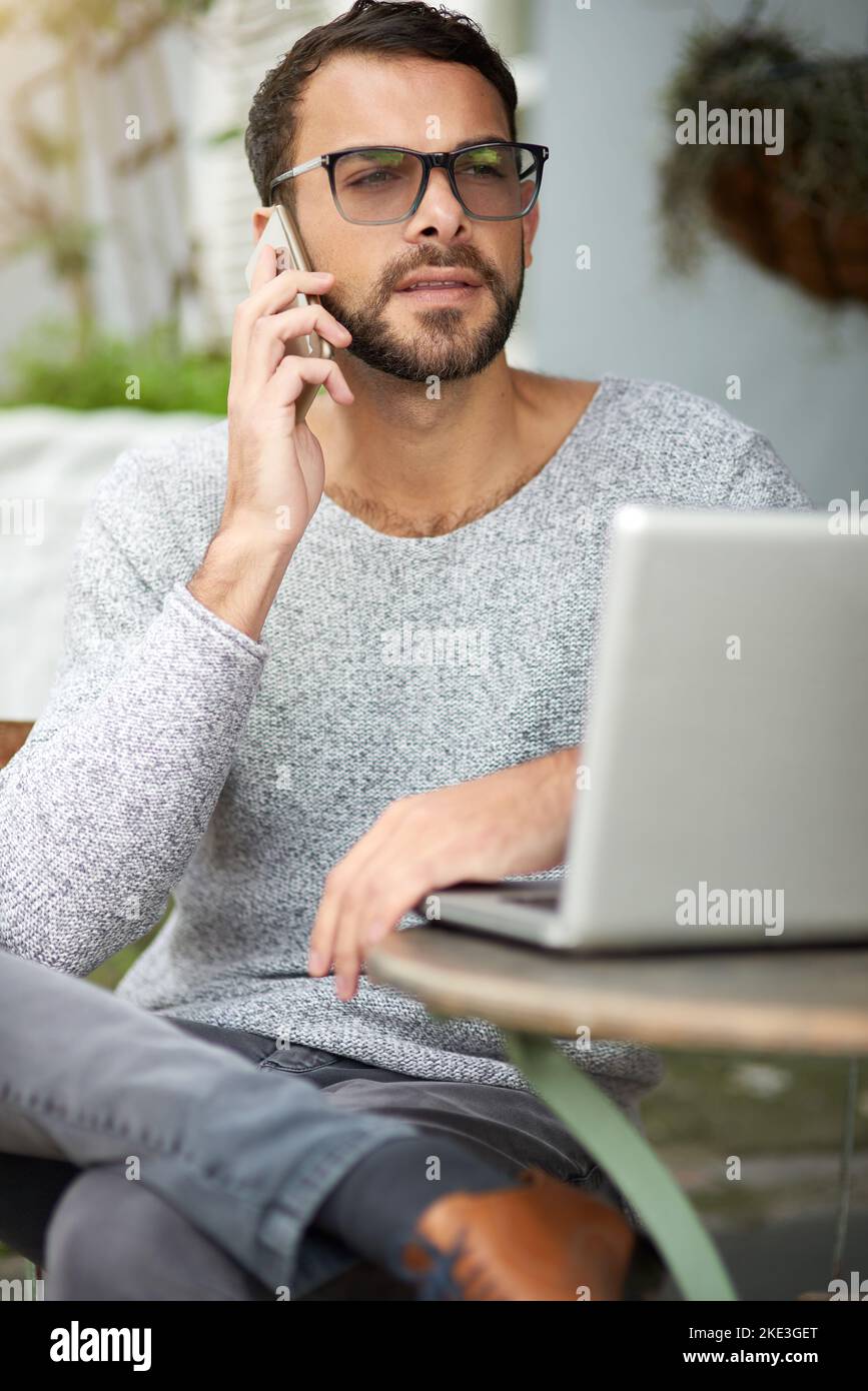 Everything about him says productivity. a handsome young man using his ...