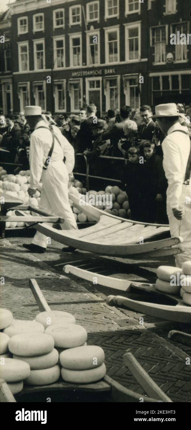 Cheese sellers in the canals of Alkmaar, Holland 1960s Stock Photo - Alamy