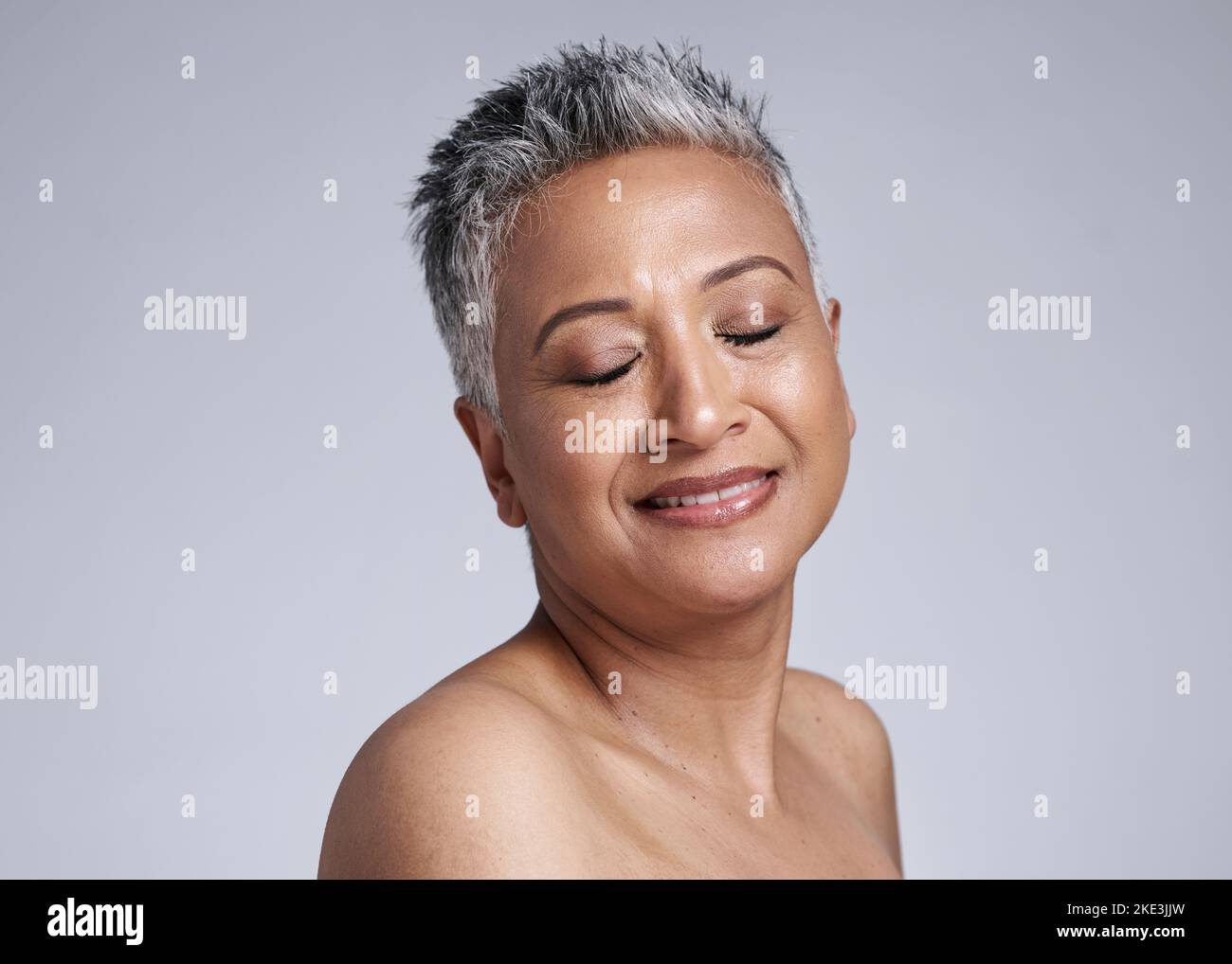 Indian elderly woman smiling hi-res stock photography and images - Alamy