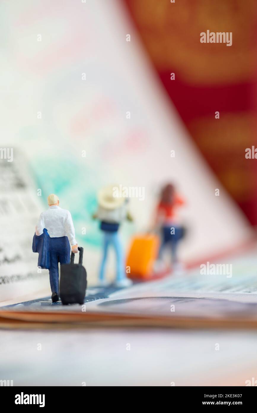 Miniature toys concept studio set up - expatriate business man pulling ...