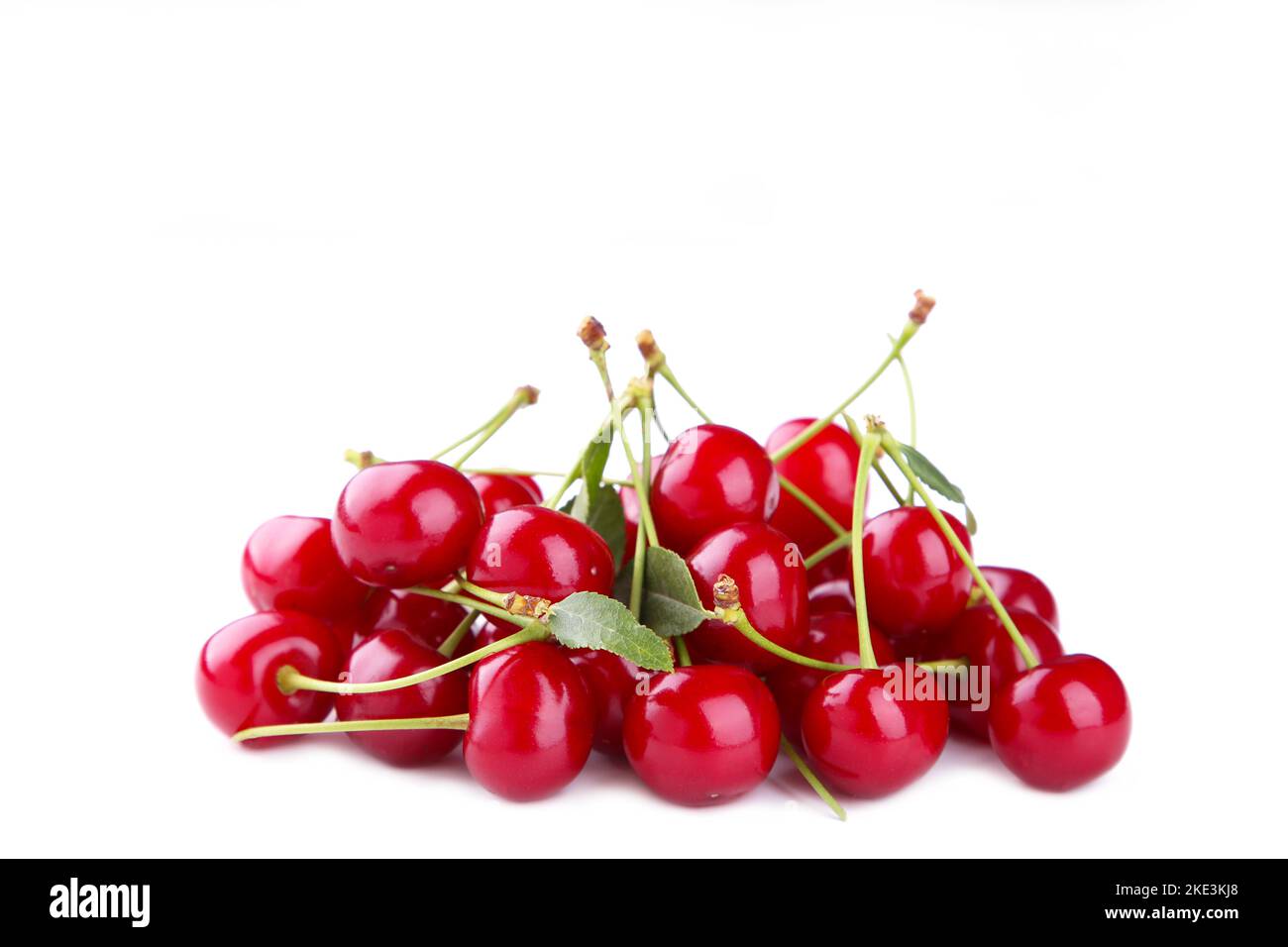 Sweet cherries isolated on the white background, cut out Stock Photo ...