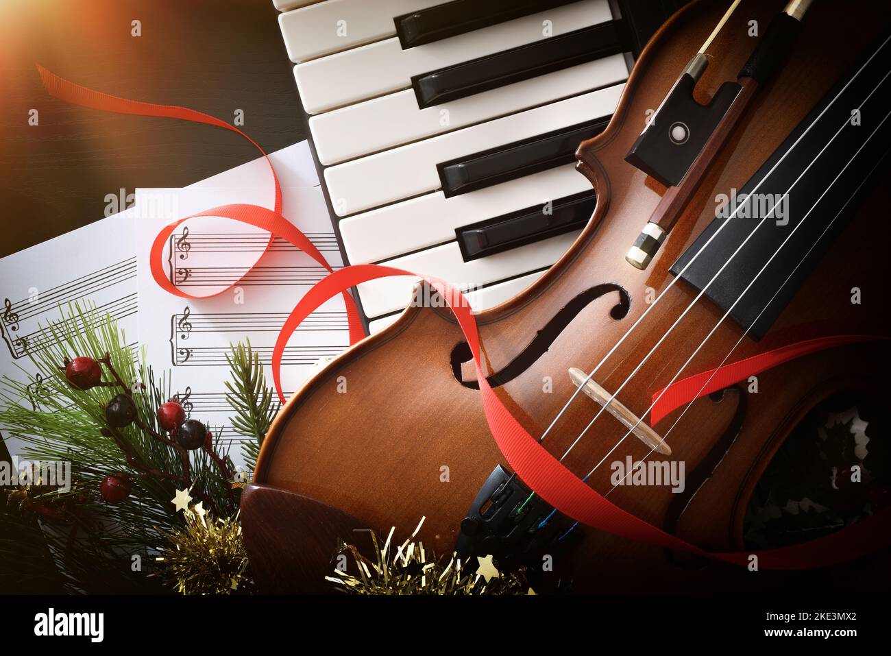 Christmas musical event concept background with piano and violin on ...