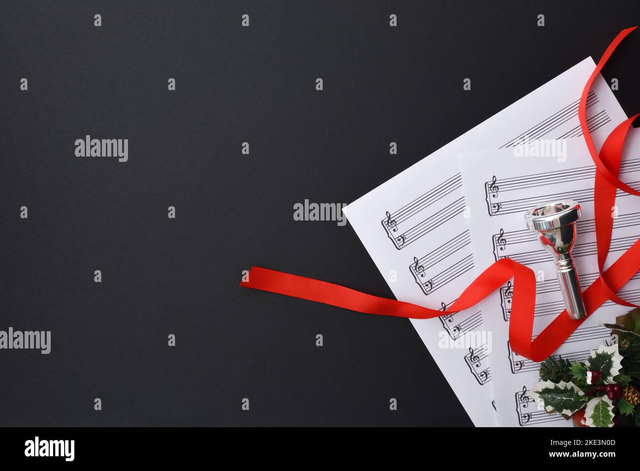 Christmas concert of brass instruments with mouthpiece and sheet music ...