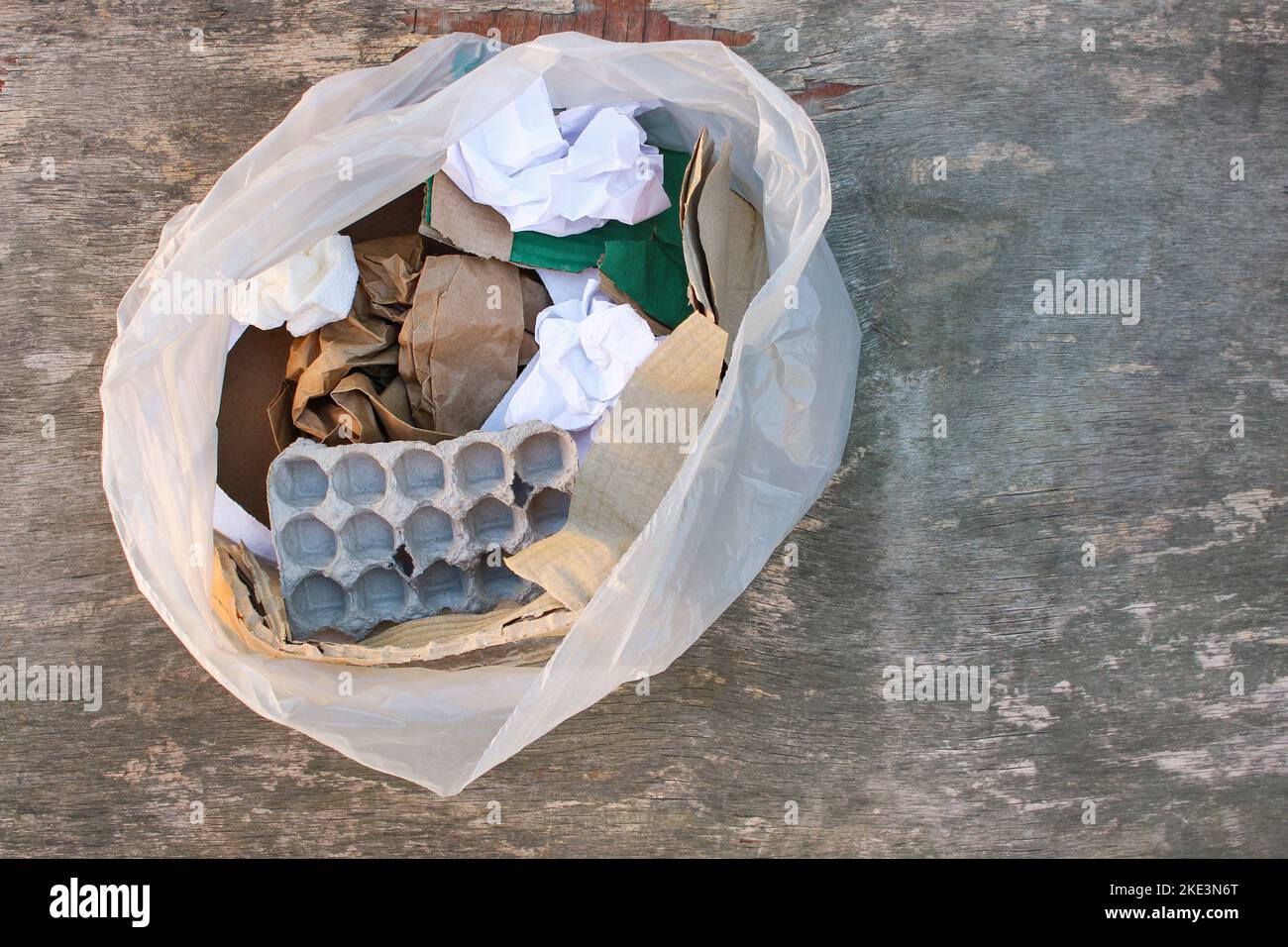 Garbage bag with different paper trash. Garbage sorting Stock Photo - Alamy