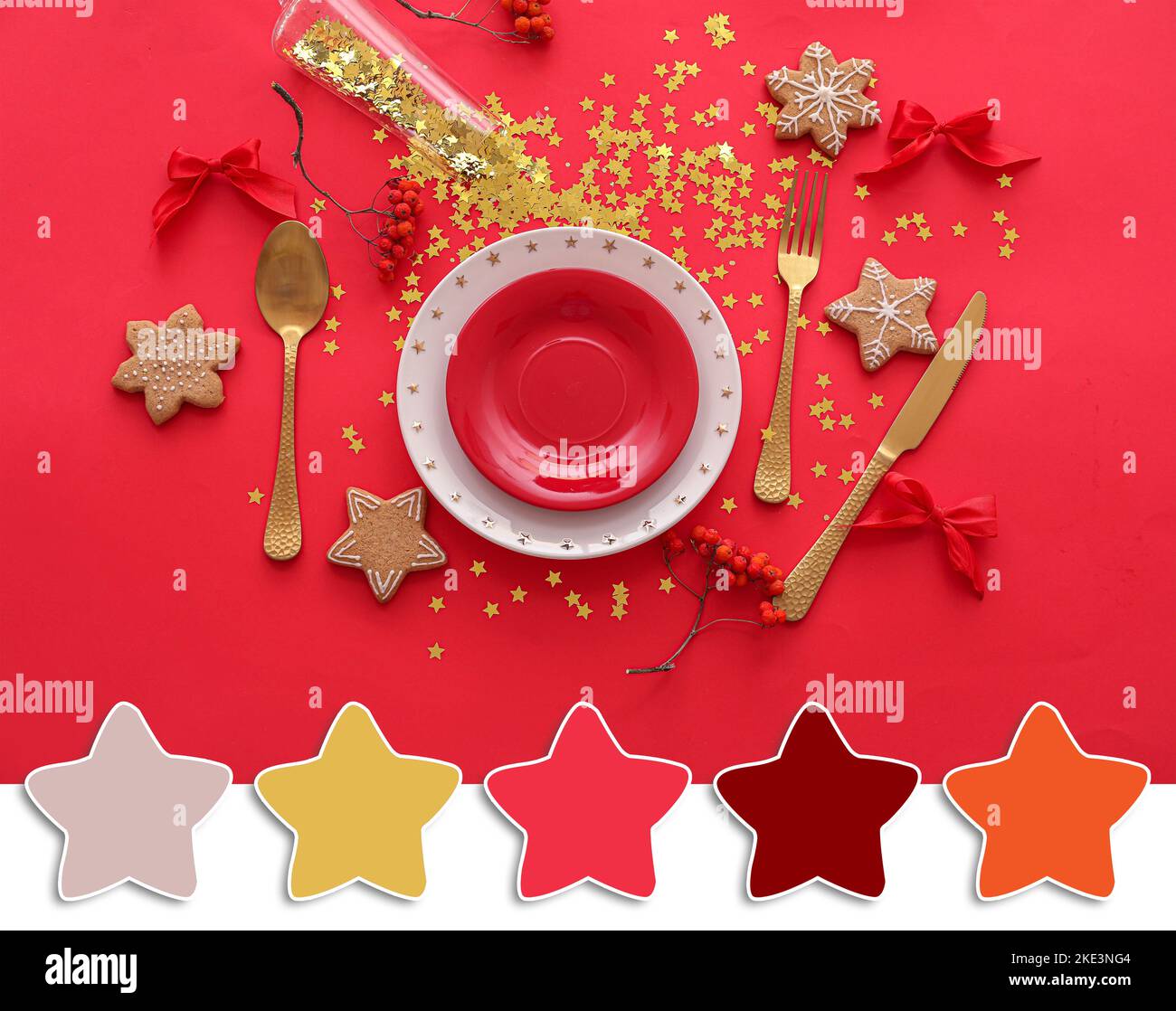 Stylish Christmas table setting on red background. Different color ...
