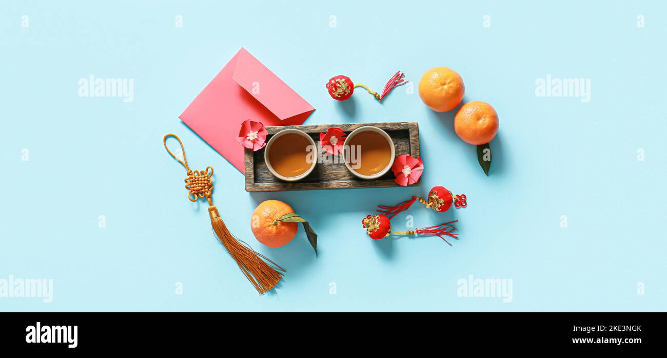 Chinese symbols on light blue background, top view. New Year ...