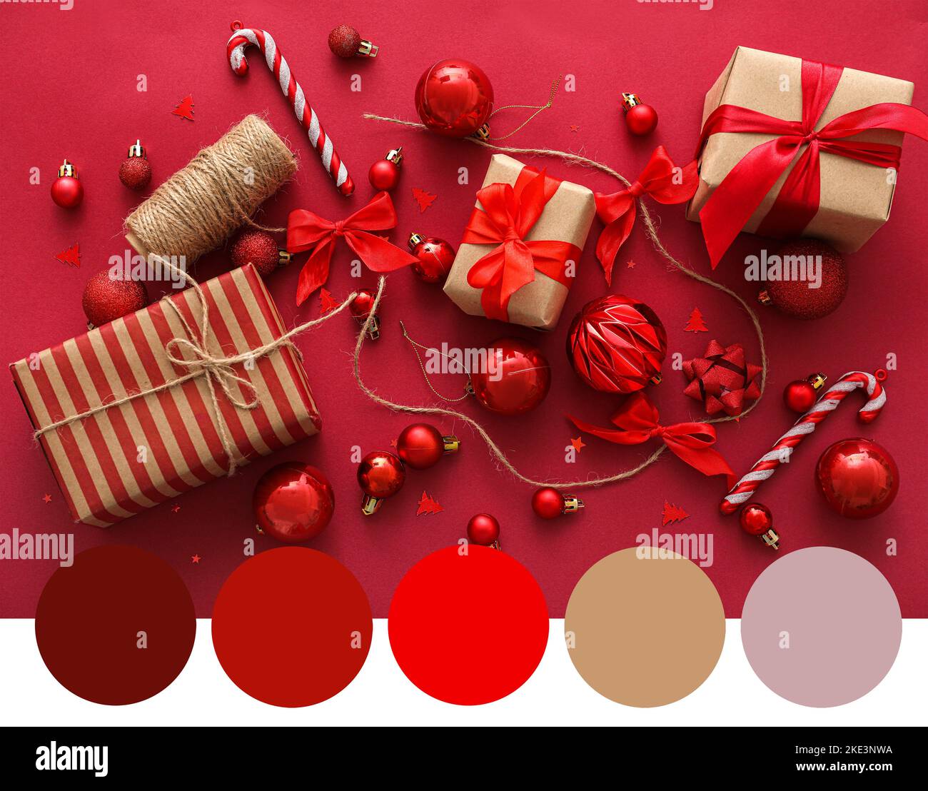 Composition with Christmas gifts and decorations on red background ...