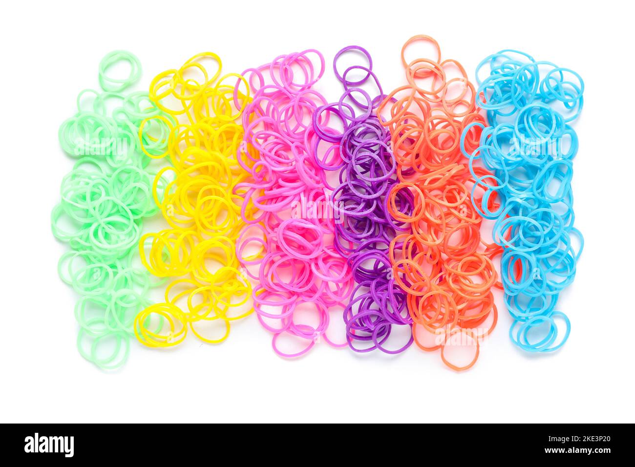 Different office rubber bands on white background Stock Photo - Alamy