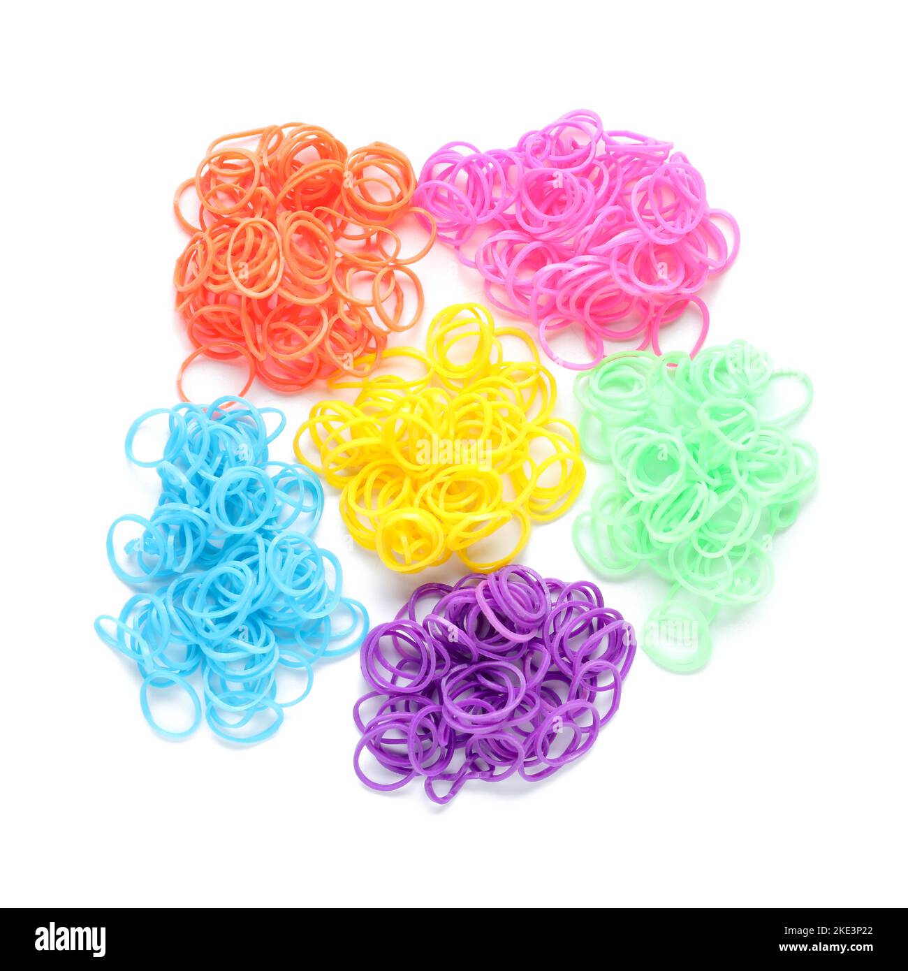 Heaps of colorful rubber bands on white background Stock Photo - Alamy