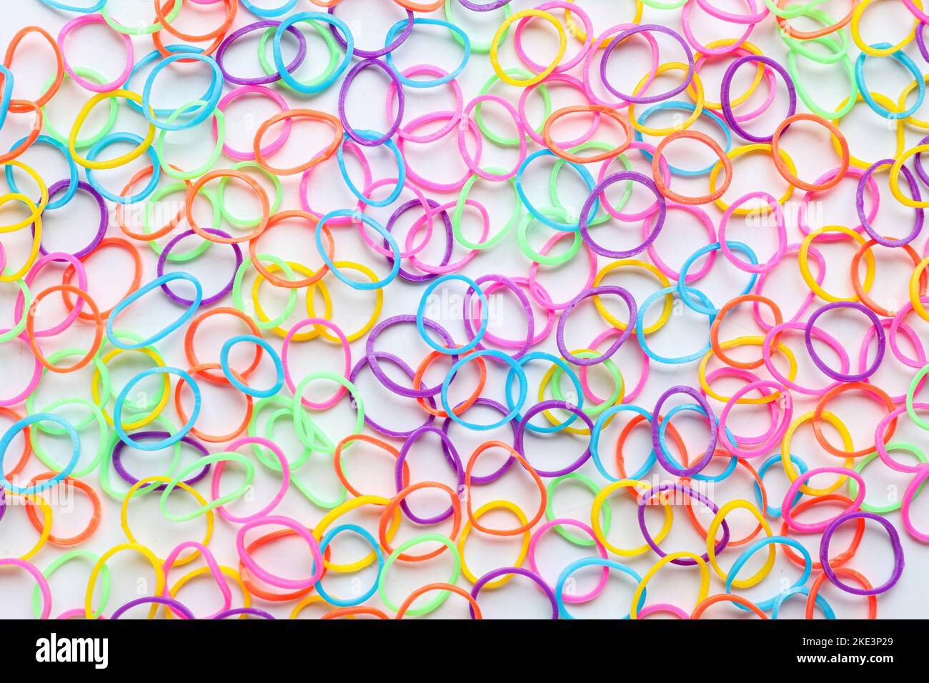 Texture of colorful rubber bands on white background Stock Photo - Alamy