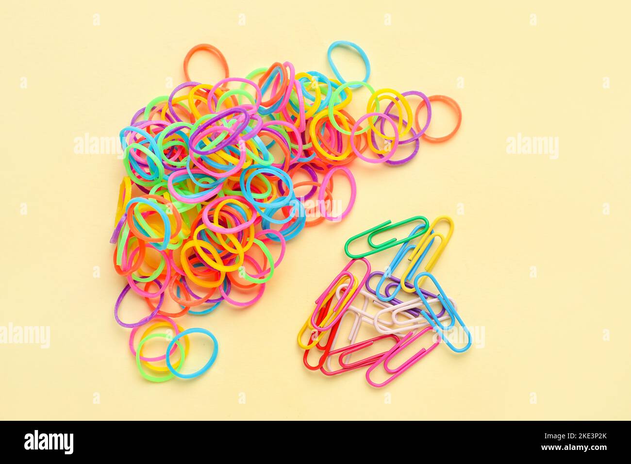 Colorful rubber bands and paper clips on color background Stock Photo ...