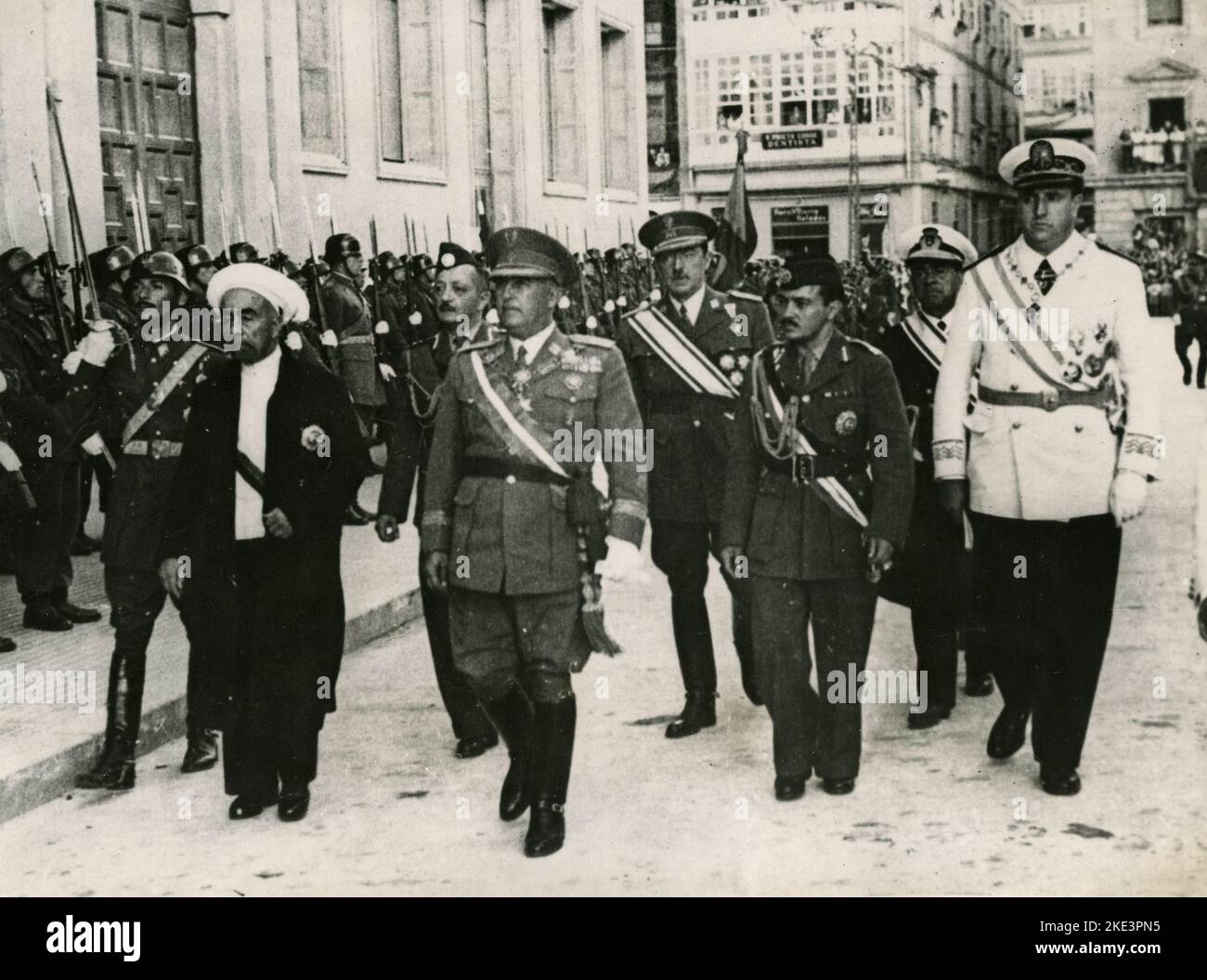 King Abdullah of Hashemite-Jordan (bearded, left) reviewing an honor ...