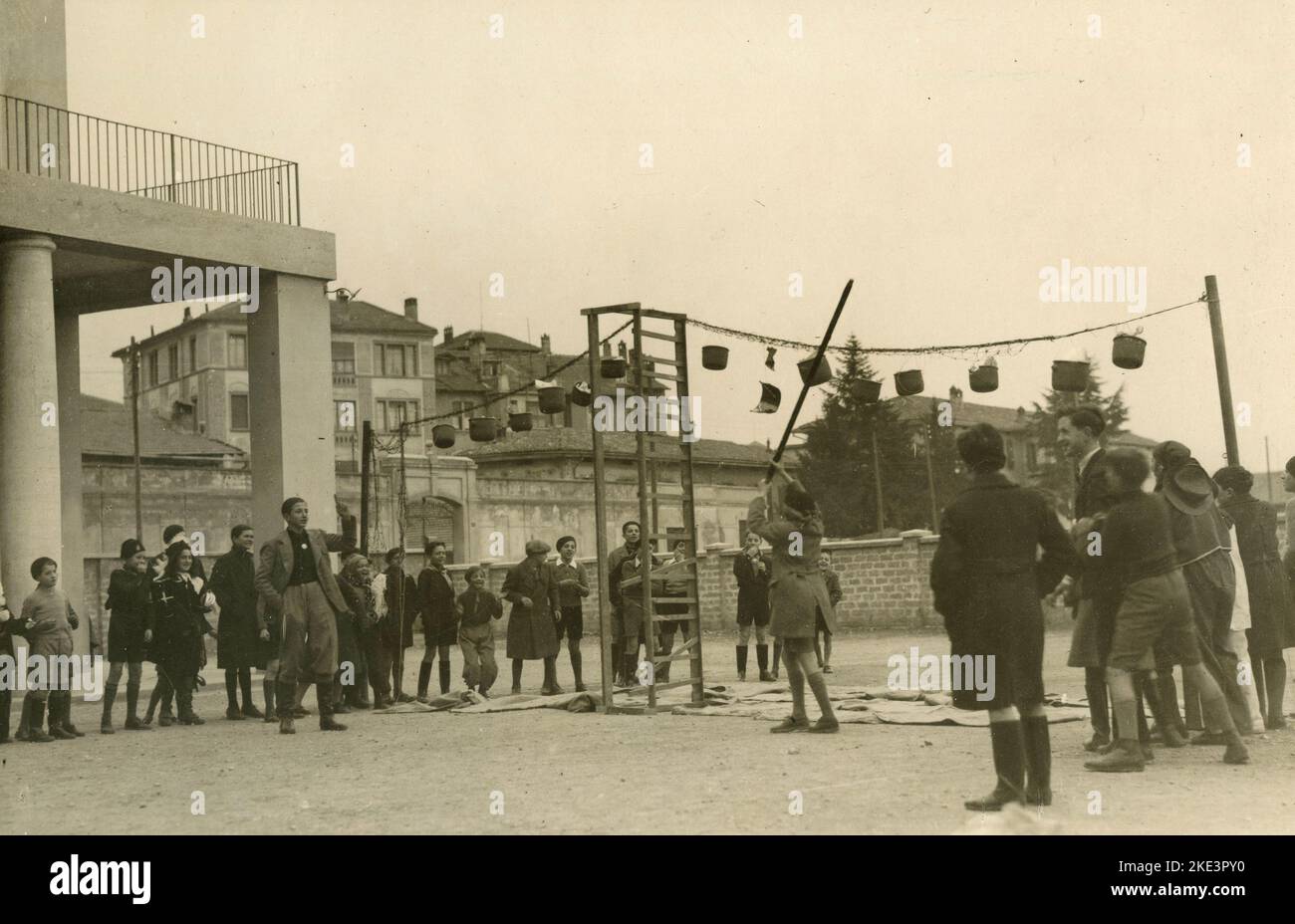Children playing Pentolaccia or Pignatta game at school, Bergamo, Italy ...