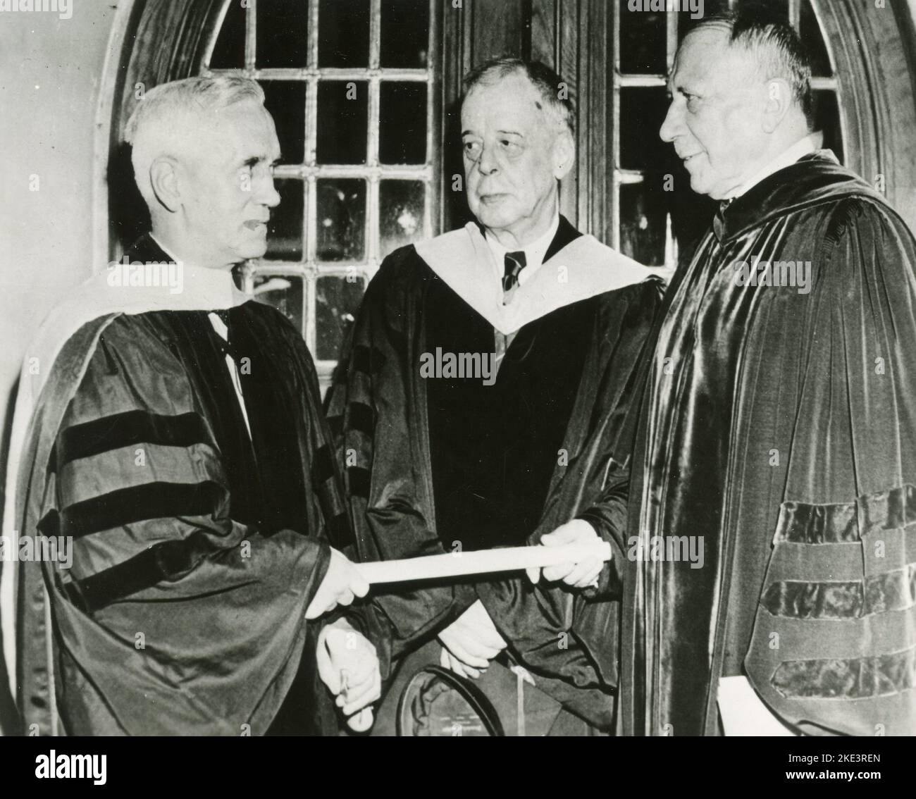 Scottish physician and microbiologist Alexander Fleming (left) receives ...