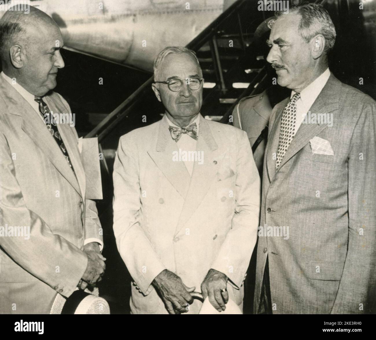 US President Harry Truman between Defence Secretary Louis Johnson (left ...