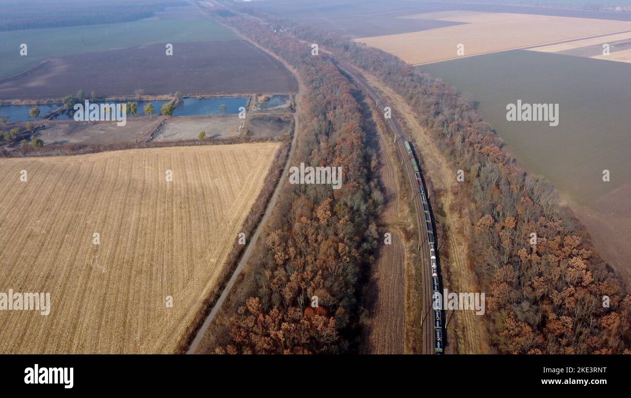 Freight train rides along tracks hi-res stock photography and images ...