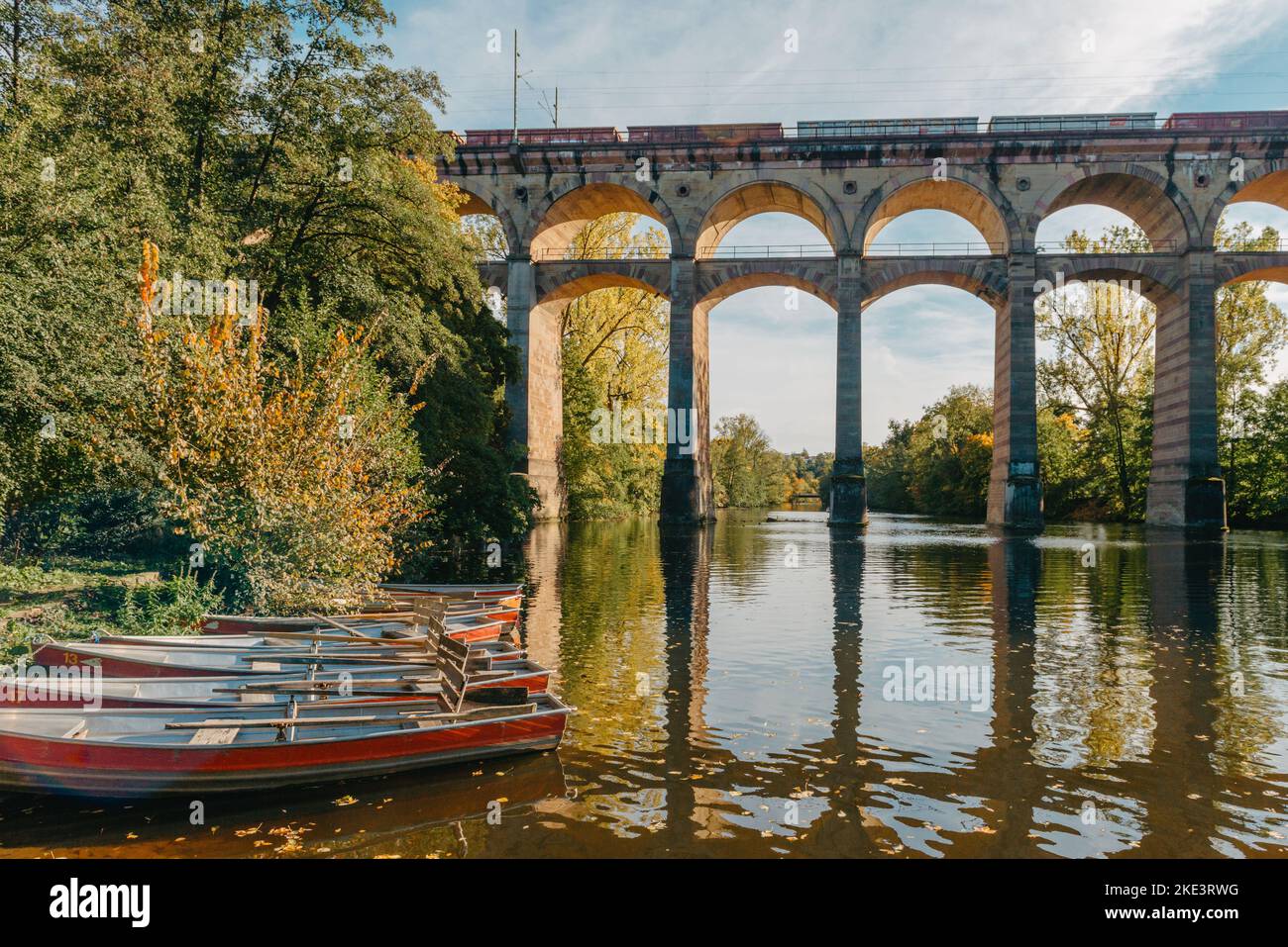 Germany train passing train bridge on cloudy day in germany hi-res ...