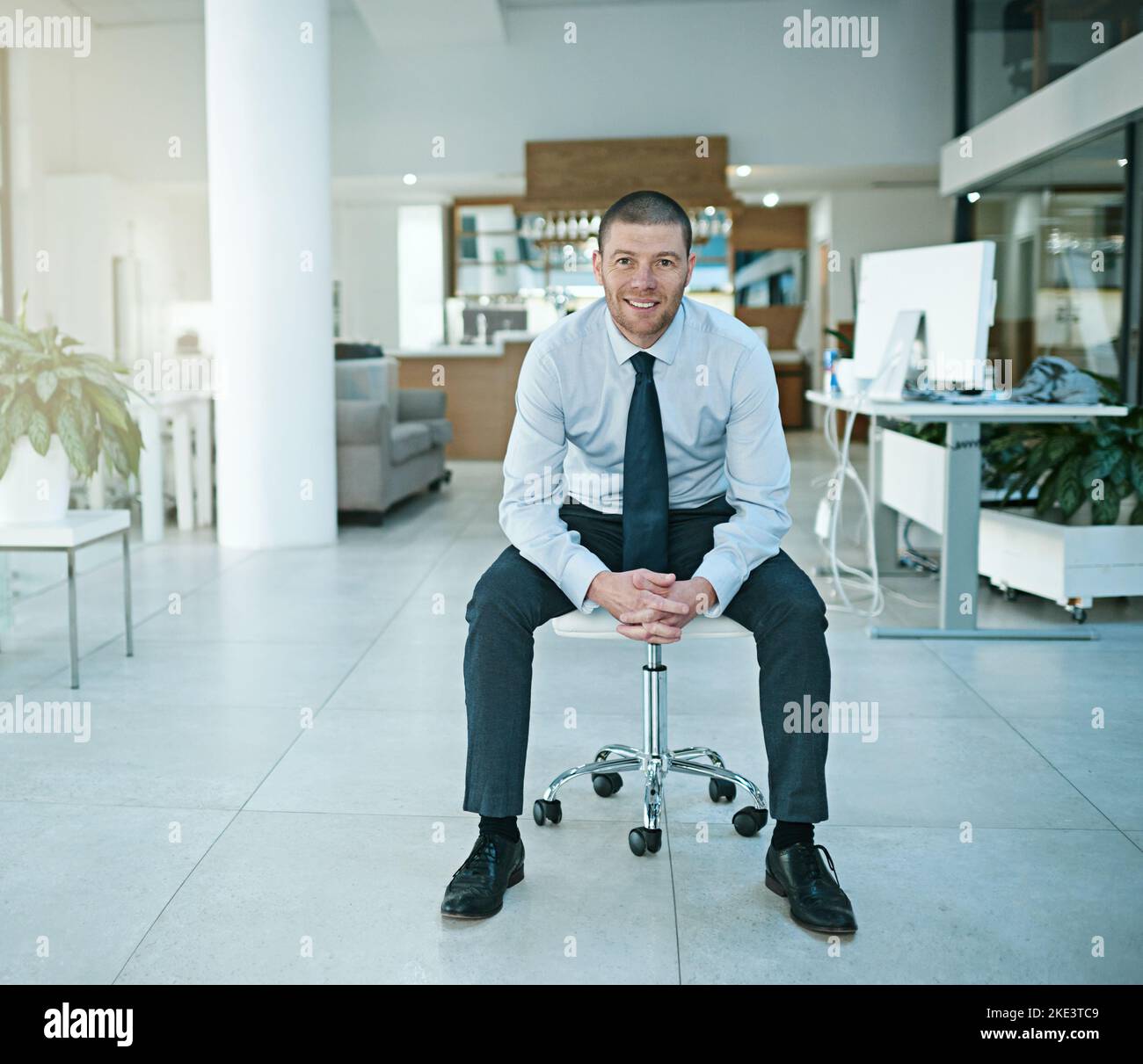 Man sitting chair hi-res stock photography and images - Alamy