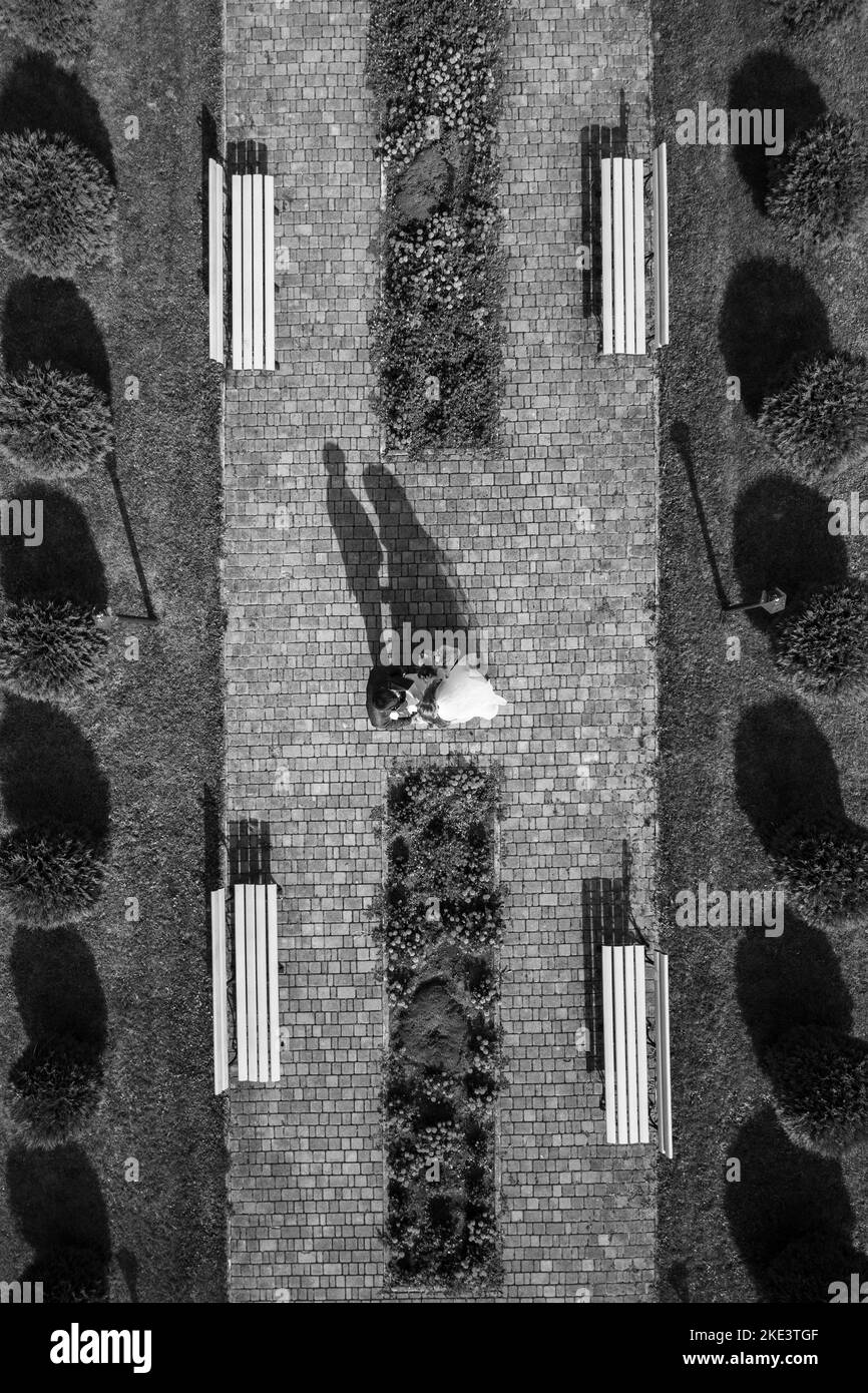 Ivano-Frankivsk, Ukraine 2021: The newlyweds walk through the ... Ivano-Frankivsk, Ukraine 2021: The newlyweds walk through the ...