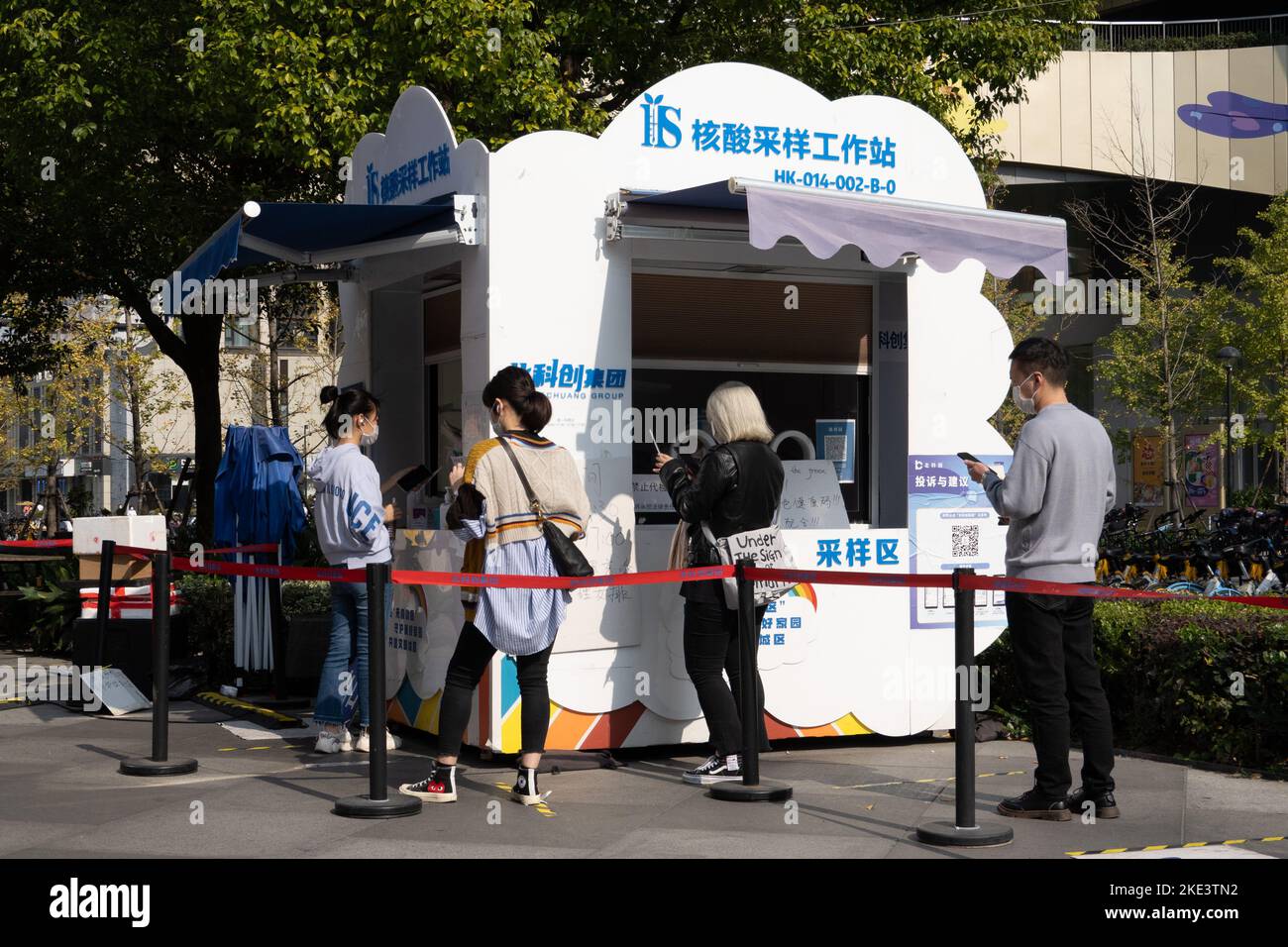 SHANGHAI, CHINA - NOVEMBER 10, 2022 - People line up to make nucleic ...