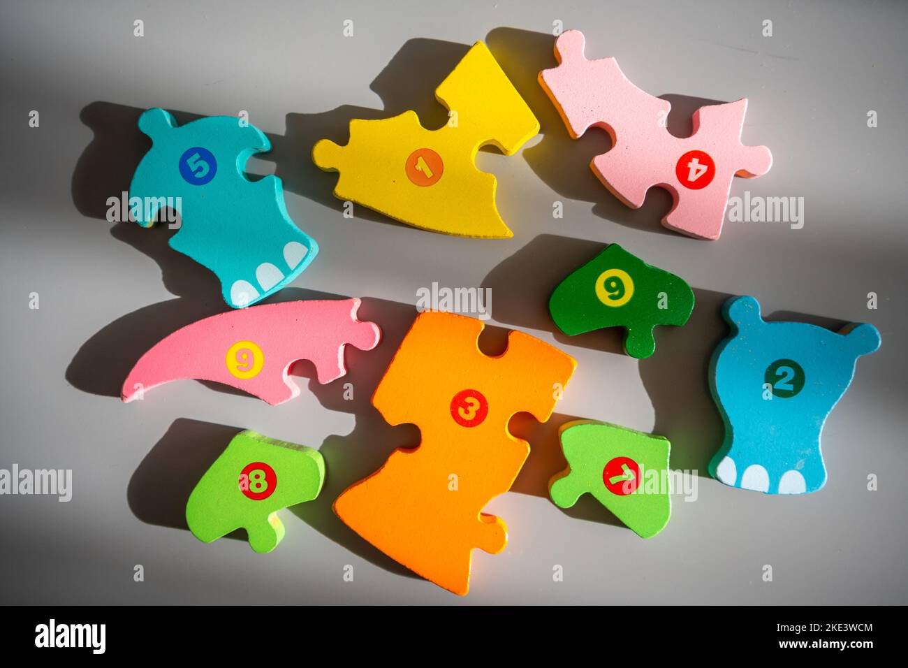 Colorful puzzle blocks signed by numbers, an alternative method of ...