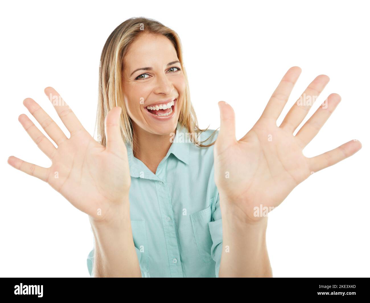Letting her hands do the talking. a happy woman posing with her hands ...